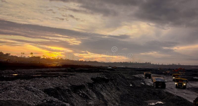 Sunrise at a mining site stock photo. Image of wallpaper - 304014460