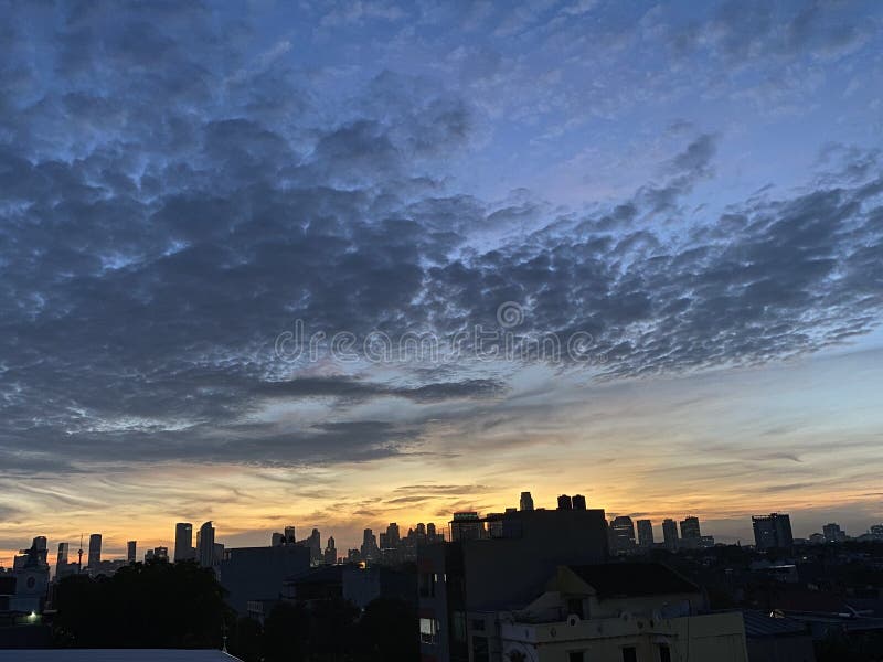 Sunrise stock photo. Image of buildings, indonesia, asia - 266100490