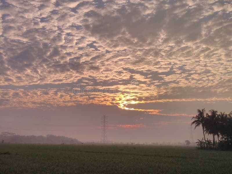 Sunrise in the village stock image. Image of clouds - 264201027