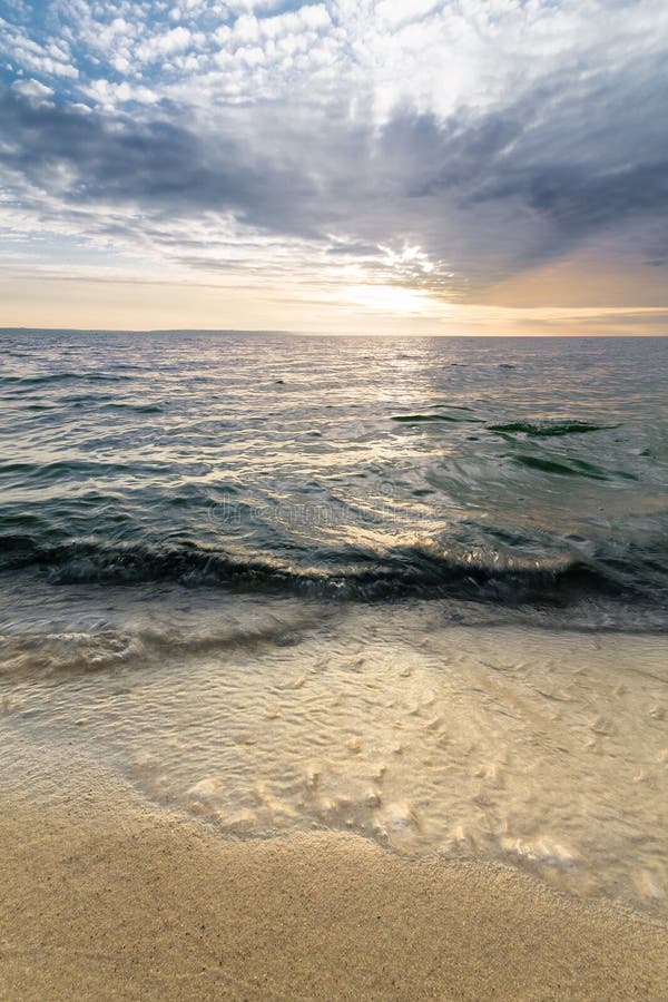 Sunrise on the water stock image. Image of brightly, cloud - 71025829