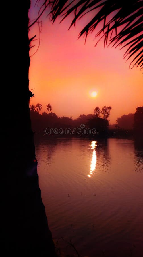 Sunrise water reflection stock photo. Image of sunrise - 98903636