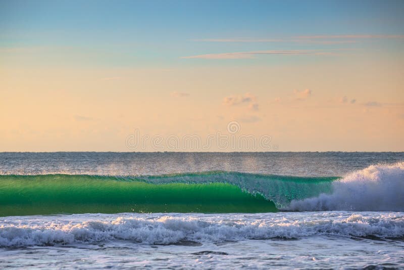 Beautiful Green Sunrise Wave Stock Photo - Image of dusk, wave: 259434866