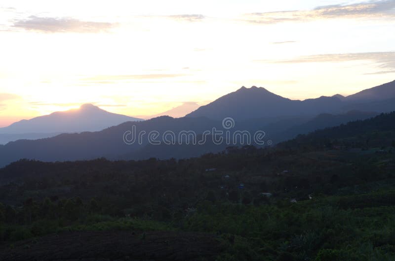 Sunrise at West Java Volcanoes, Indonesia Stock Photo - Image of cloudy ...