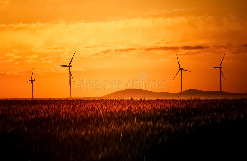 Sunrise with wind turbines stock image. Image of twilight - 244918219