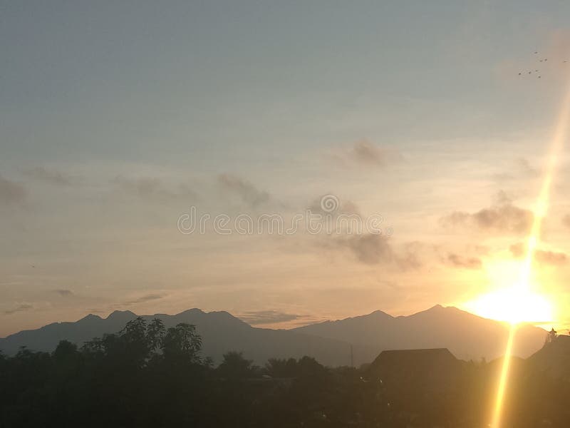 Sunrises at Mataram City and Rinjani Mountain Stock Photo - Image of ...