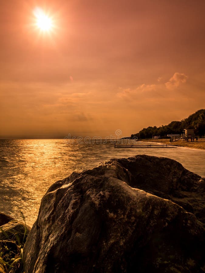 Sunrising at the sea stock image. Image of rock, coastal - 79168967