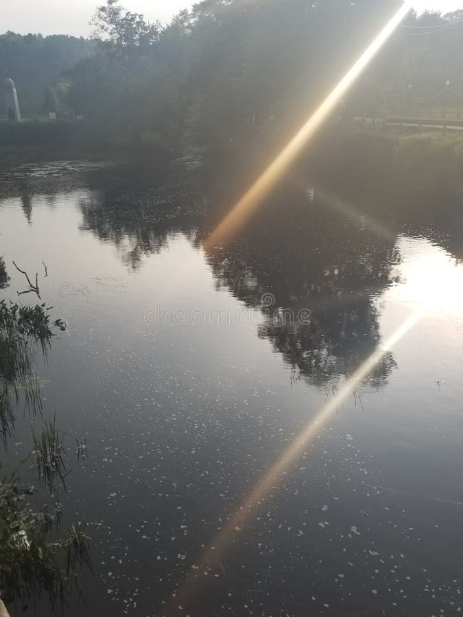 Reflection stock image. Image of suns, water, reflection - 125568519