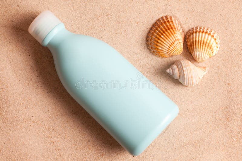 Sunscreen in sand stock photo. Image of facial, care - 15637252