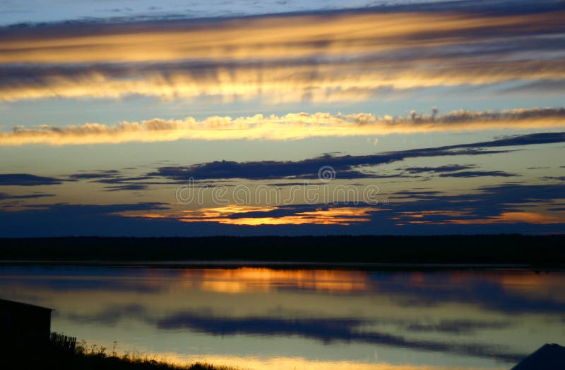 Two Sunsets stock image. Image of hazy, rich, natural - 7369551