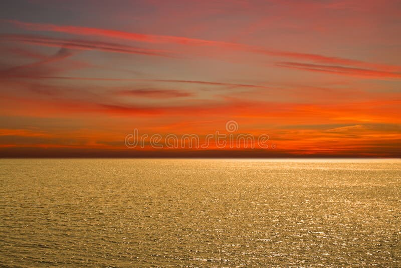 Golden sunset on beach stock photo. Image of shoreline - 31549198