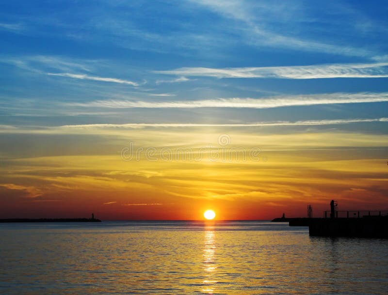 Ship wake at sunset stock photo. Image of sunset, water - 22692630