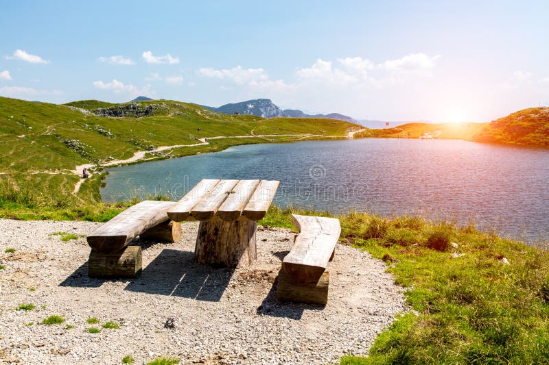 Sunset Above the Bench at the Shore of the Lake Stock Image - Image of ...