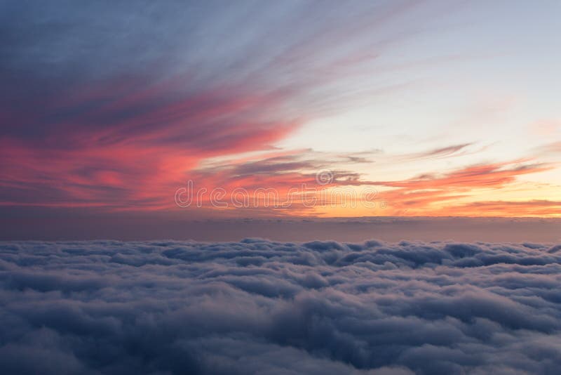 Sunset above clouds stock image. Image of dusk, horizon - 36202519