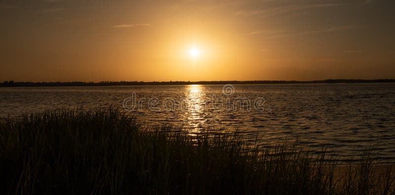 Sunset Across the Cape Fear River Stock Photo - Image of clouds ...