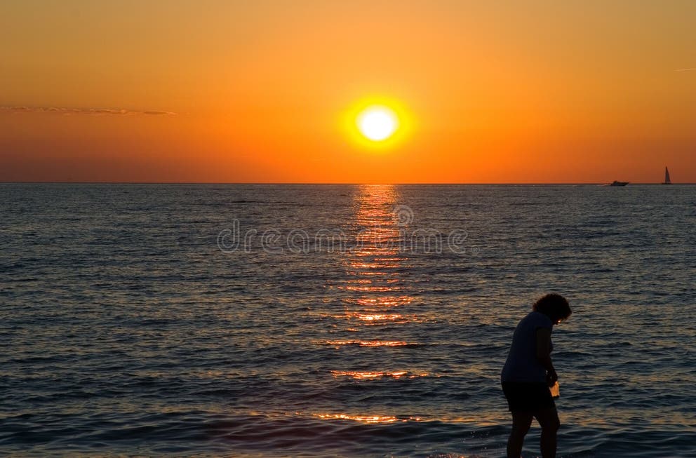 Sunset Activities stock image. Image of dusk, seaside, ocean - 687595