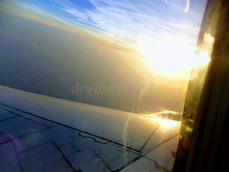 Sunset from Airplane Windows View Plane Wings Stock Photo - Image of ...