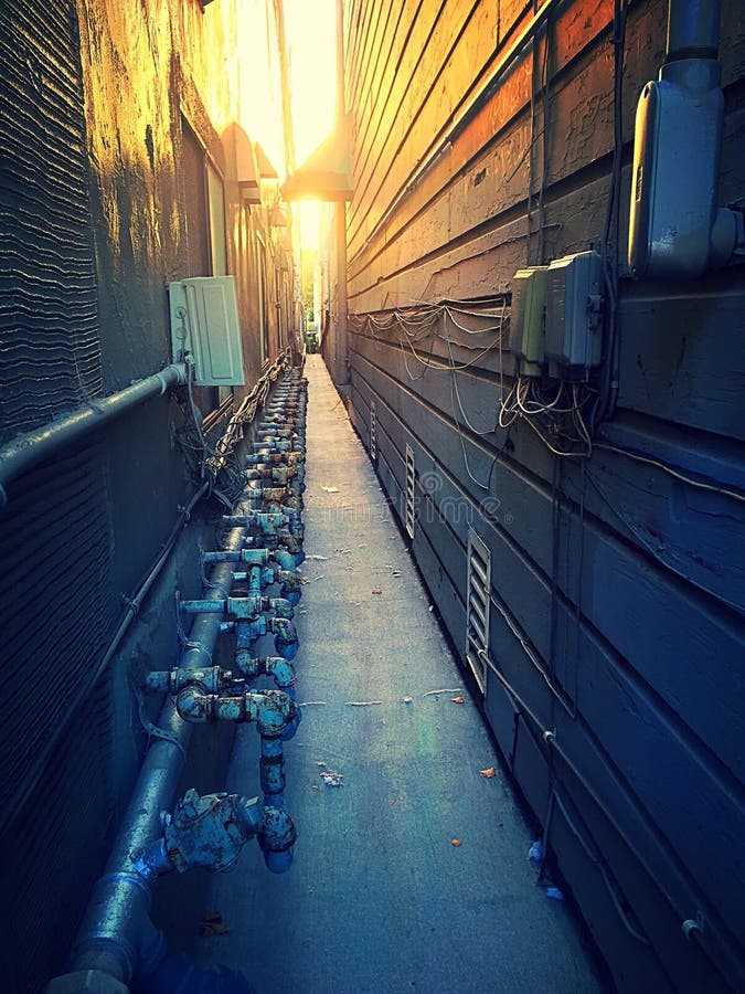 Sunset alley stock image. Image of electricity, sunset - 65582435