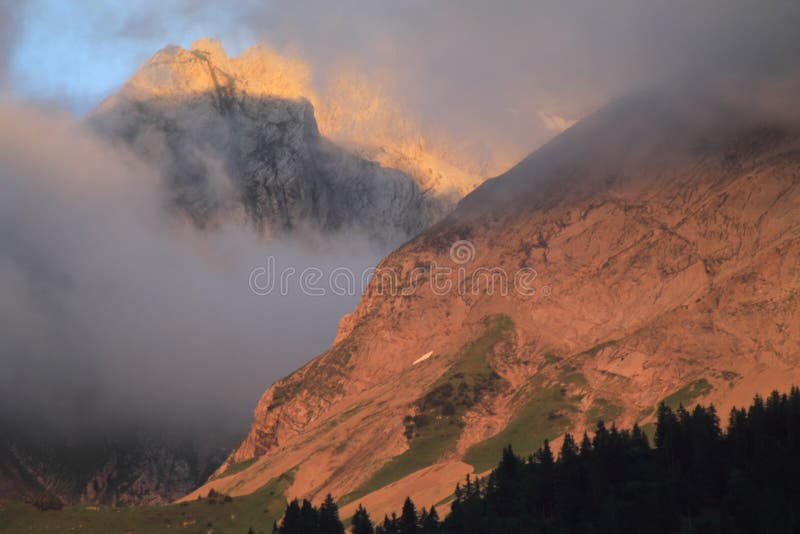 Sunset on the Alps stock photo. Image of reflection, france - 33670106