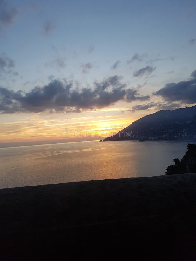 Sunset on Amalfi coast editorial stock photo. Image of cloudy - 127325773