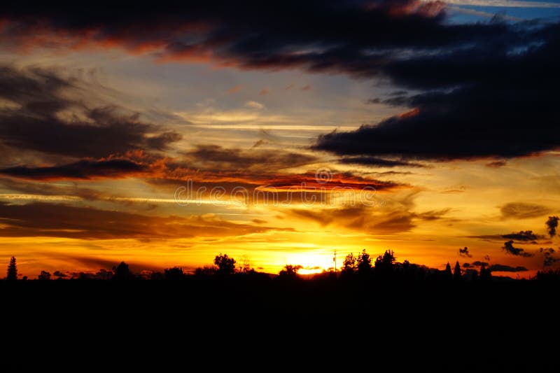 Sunset stock image. Image of bright, blue, clouds, black - 96301739