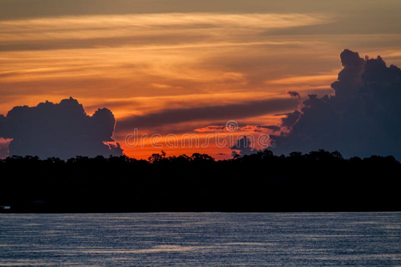 Sunset on Amazon river stock photo. Image of america - 131791154