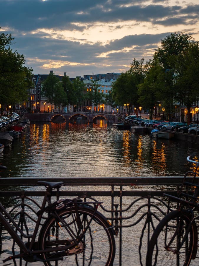 Sunset in Amsterdam at the River Stock Photo - Image of architecture ...