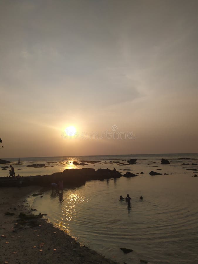 Sunset in anyer beach stock image. Image of beach, sunset - 200216329