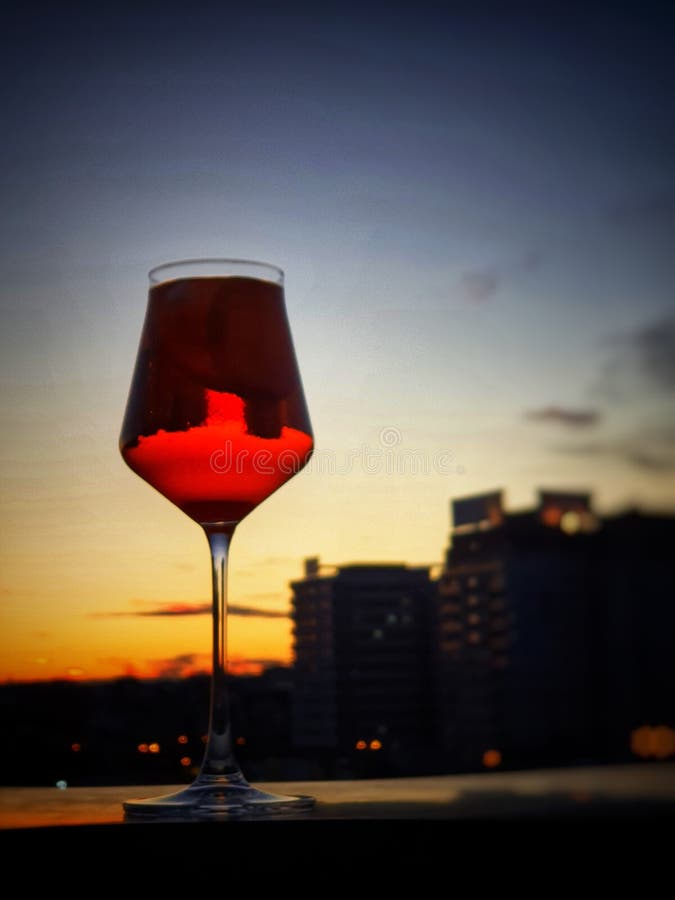 Sunset with Aperol Spritz. stock image. Image of light - 231949117