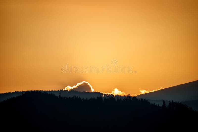 Sunset in the Austrian Alps with Silhouette of Colorful Clouds and ...