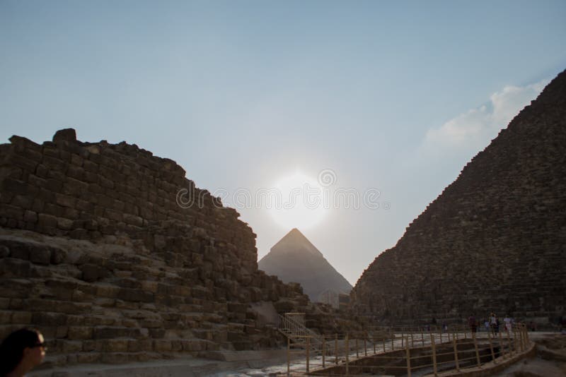 Sunset on the Background of the Egyptian Pyramids Stock Photo - Image ...
