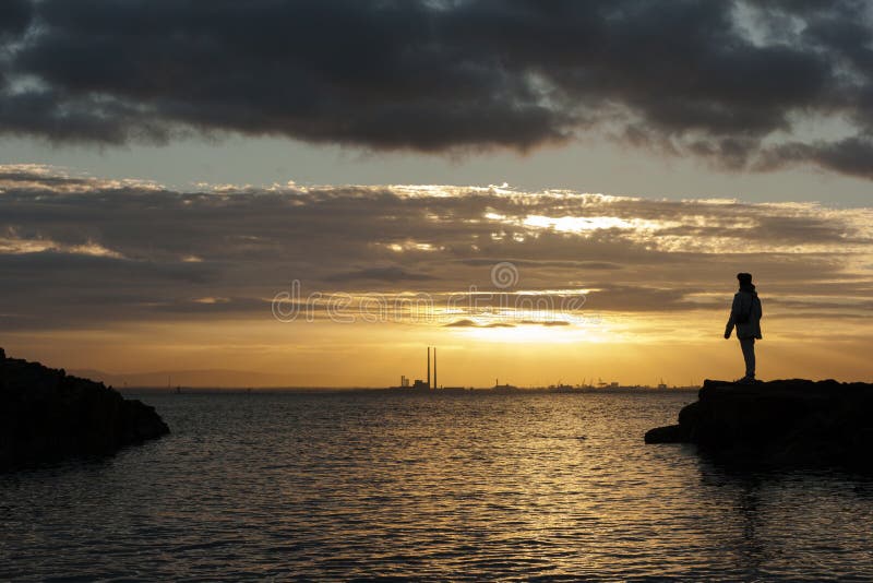 Sunset Backlit with Human Silhouette Stock Image - Image of rock ...