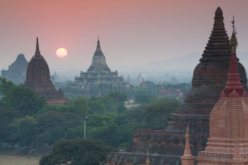 Sunset at Bagan, Myanmar. stock photo. Image of famous - 65872178