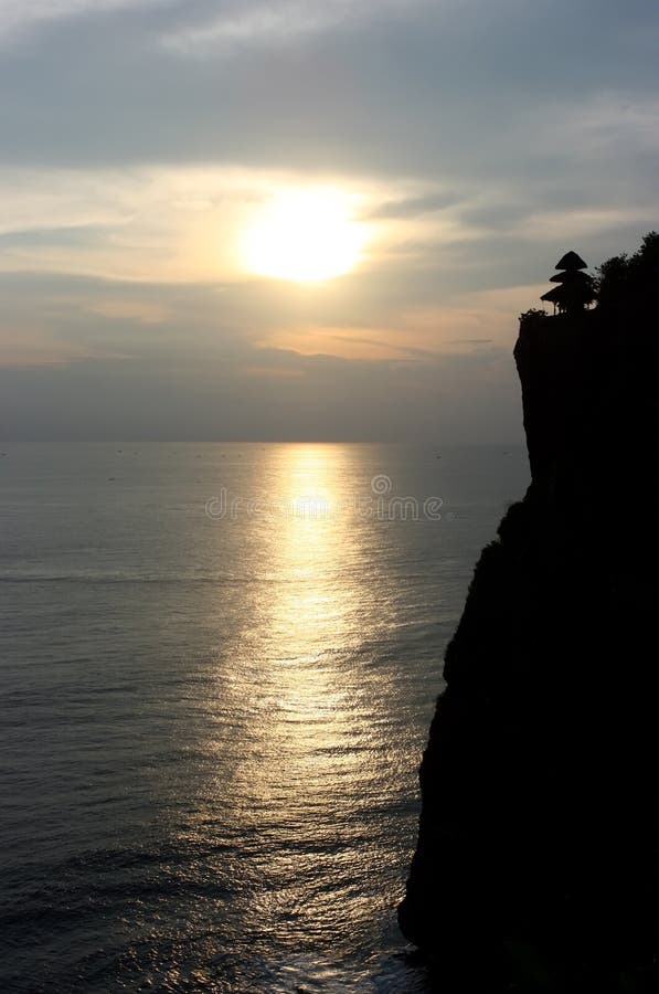 Sunset on Bali stock image. Image of rock, water, twilight - 10074075