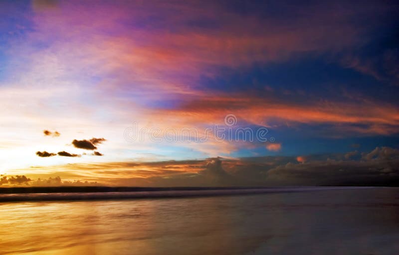 Sunset of Bali stock image. Image of horizon, stones, reflection - 7571445