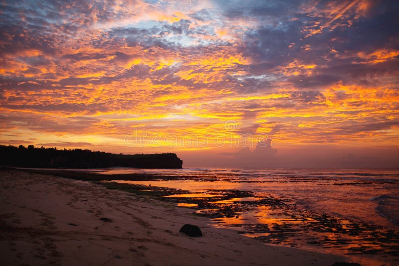 Sunset in Bali stock photo. Image of sunny, sand, holiday - 59041152