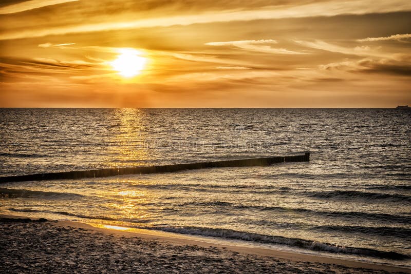 Sunset Baltic Sea stock image. Image of sand, scene, sunset - 53758423