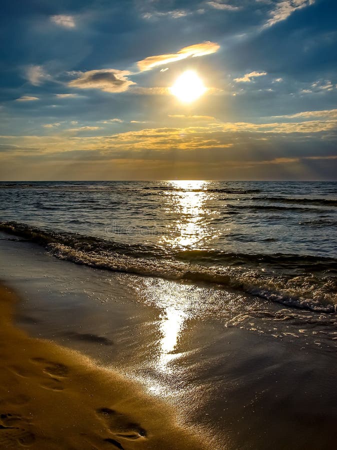 Sunset on the Baltic Sea Coast in Warnemuende, Germany Stock Photo ...