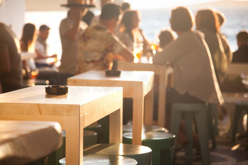 Sunset Bar by the Beach - Focus on Table Stock Image - Image of ocean ...