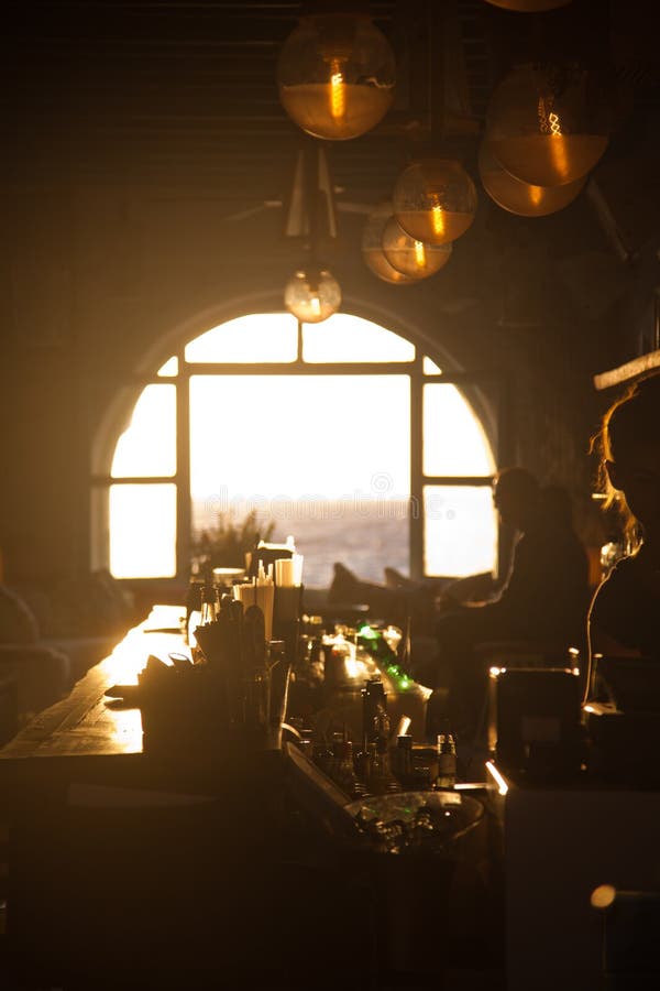 Sunset Bar by the Beach - Focus on Table Stock Photo - Image of beach ...