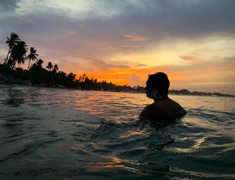Sunset bath. stock photo. Image of dusk, bath, ocean - 160879400