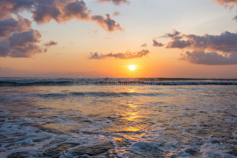 Sunset on the Beach in Bali Stock Photo - Image of nature, reflection ...