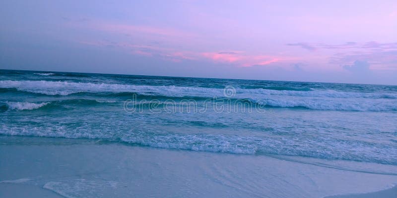 Miramar beach sunset stock photo. Image of beach, violet - 111588292