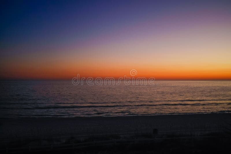 Sunset on the Beaching Panama City Beach. Stock Image - Image of dusk ...
