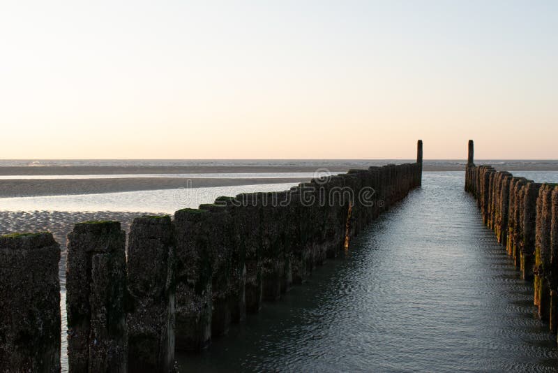 Sunset at the Beach, Blue Hour, Breakwaters Stock Image - Image of ...