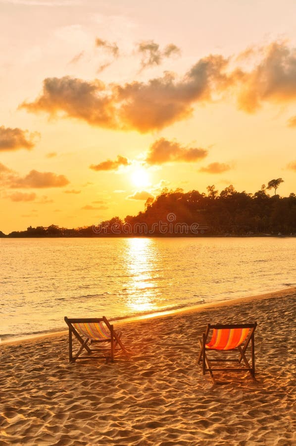 Sunset beach chairs stock photo. Image of scenic, chair - 81332776