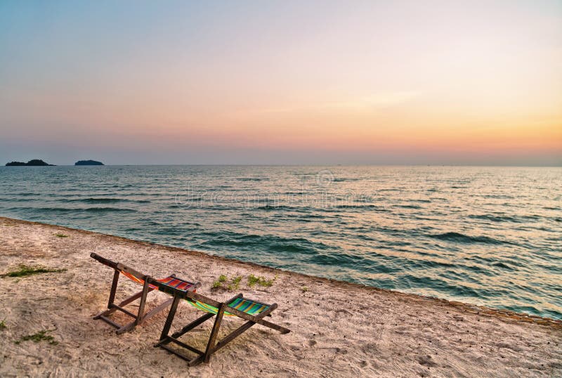 Sunset beach chairs stock photo. Image of paradise, coast - 64668134