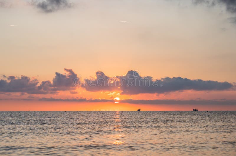 Sunset on the Beach with Clouds Stock Photo - Image of sunset, nature ...