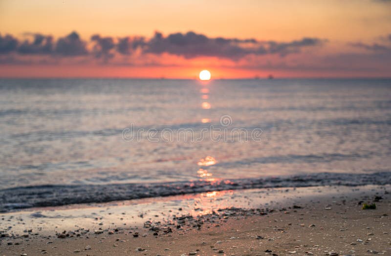 Sunset on the Beach with Clouds Stock Photo - Image of travel, golden ...