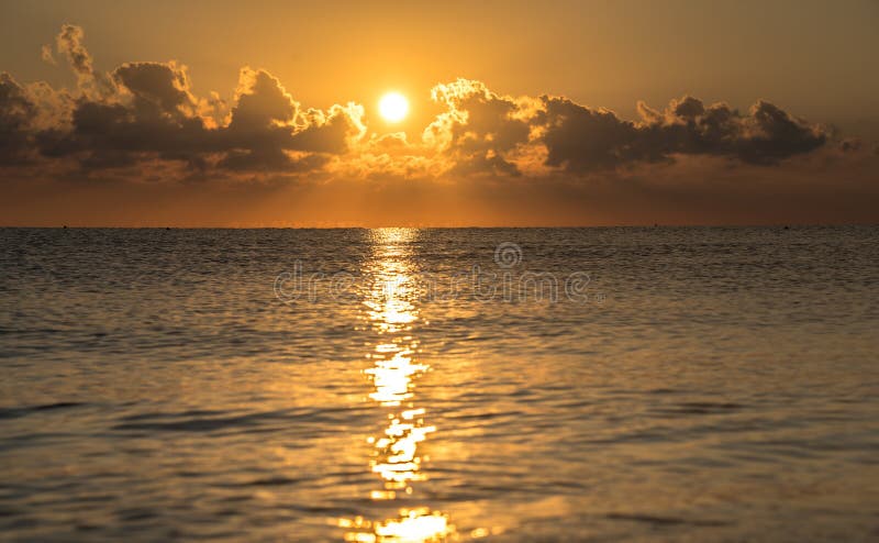 Sunset on the Beach with Clouds Stock Image - Image of beautiful ...