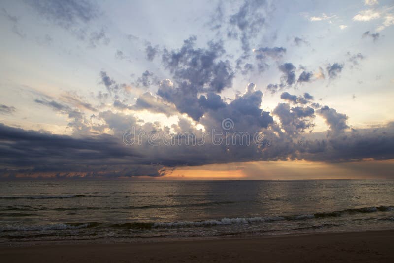 Sunset at the Beach with the Sun Rays Stock Image - Image of blue ...